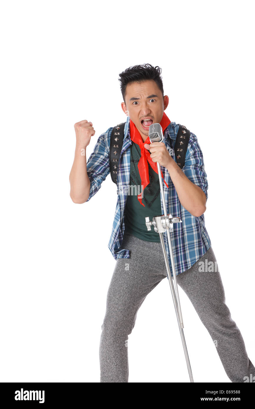 Portrait of young man singing Stock Photo - Alamy