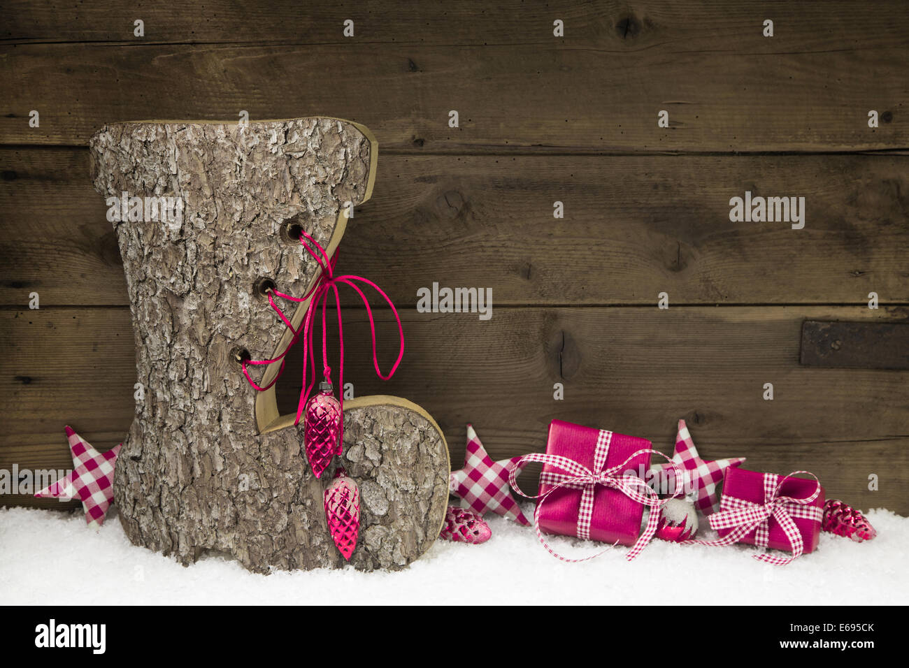 Wooden christmas background with a handmade boot of wood. Idea for a ...