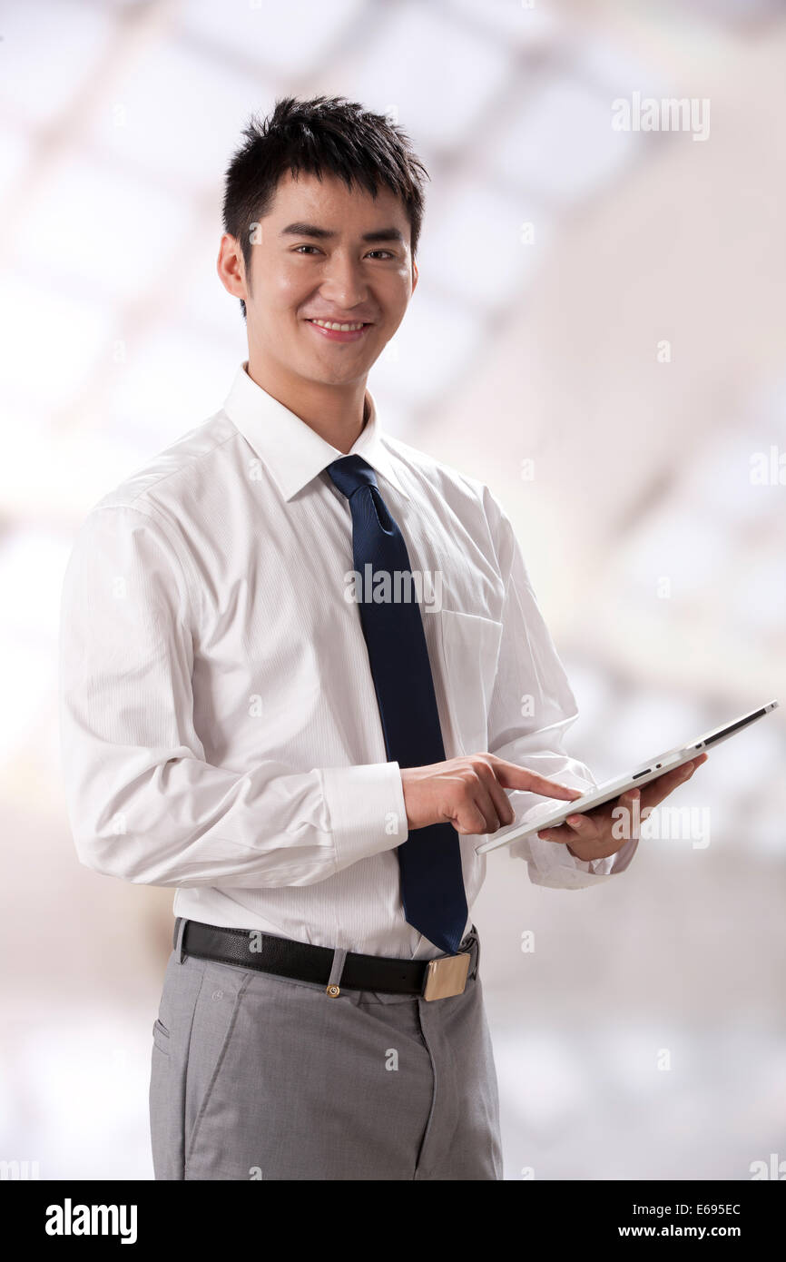 Young businessman using laptop Stock Photo - Alamy Young businessman using laptop Stock Photo - Alamy