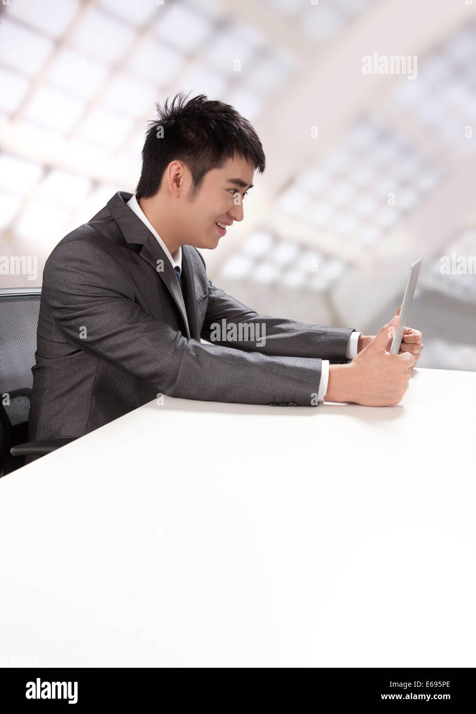 Chinese Men Using Ipad High Resolution Stock Photography and Images - Alamy