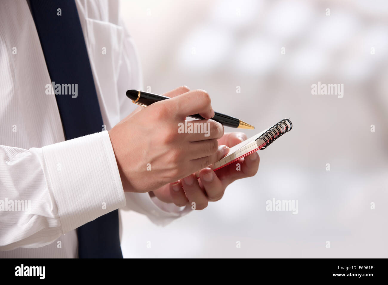 Close-up of hand writing Stock Photo - Alamy