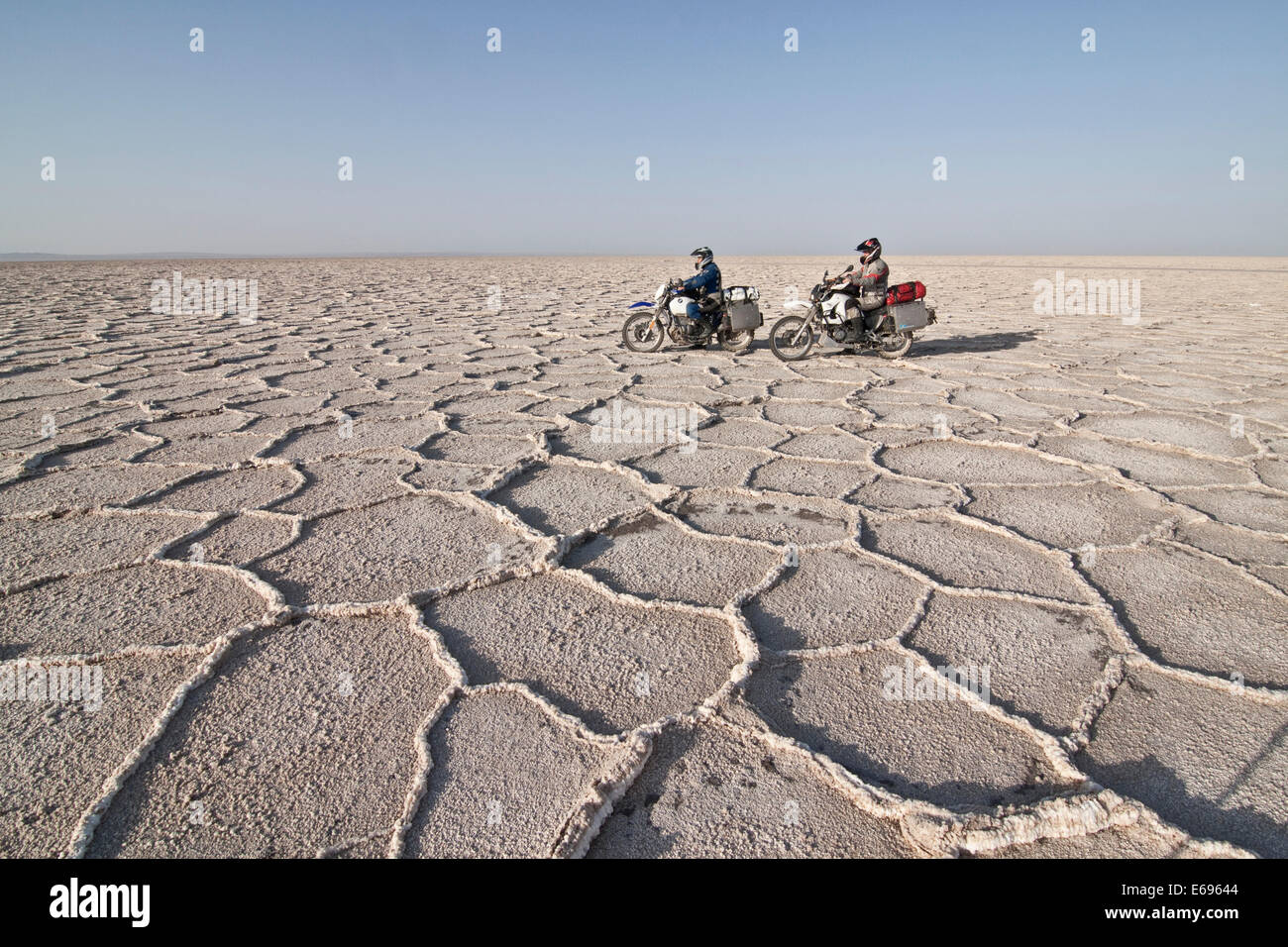 Biker on a motorcycle trip, Dasht-e Kavir or Great Salt Desert ...