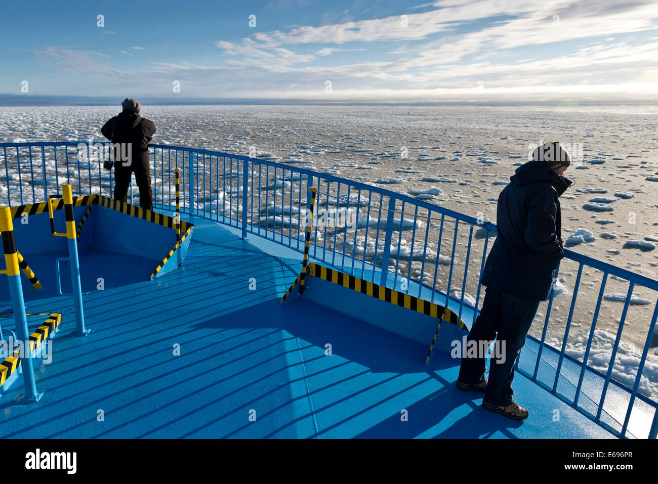 Expedition ship sailing through ice floes, pack ice, Arctic Ocean ...