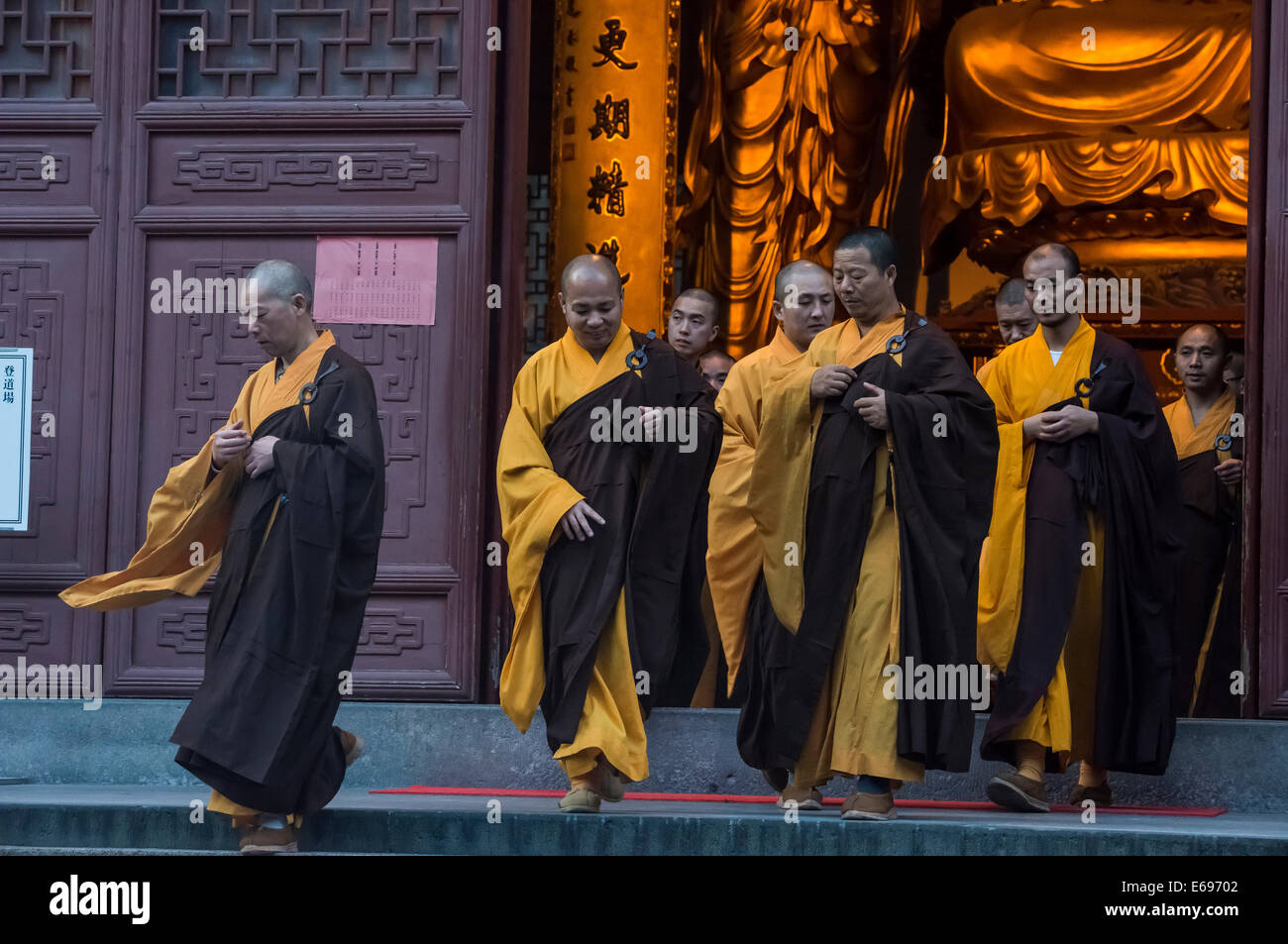 Devout monks leaving a temple, Lingying Monastery, Xihu, Hangzhou ...