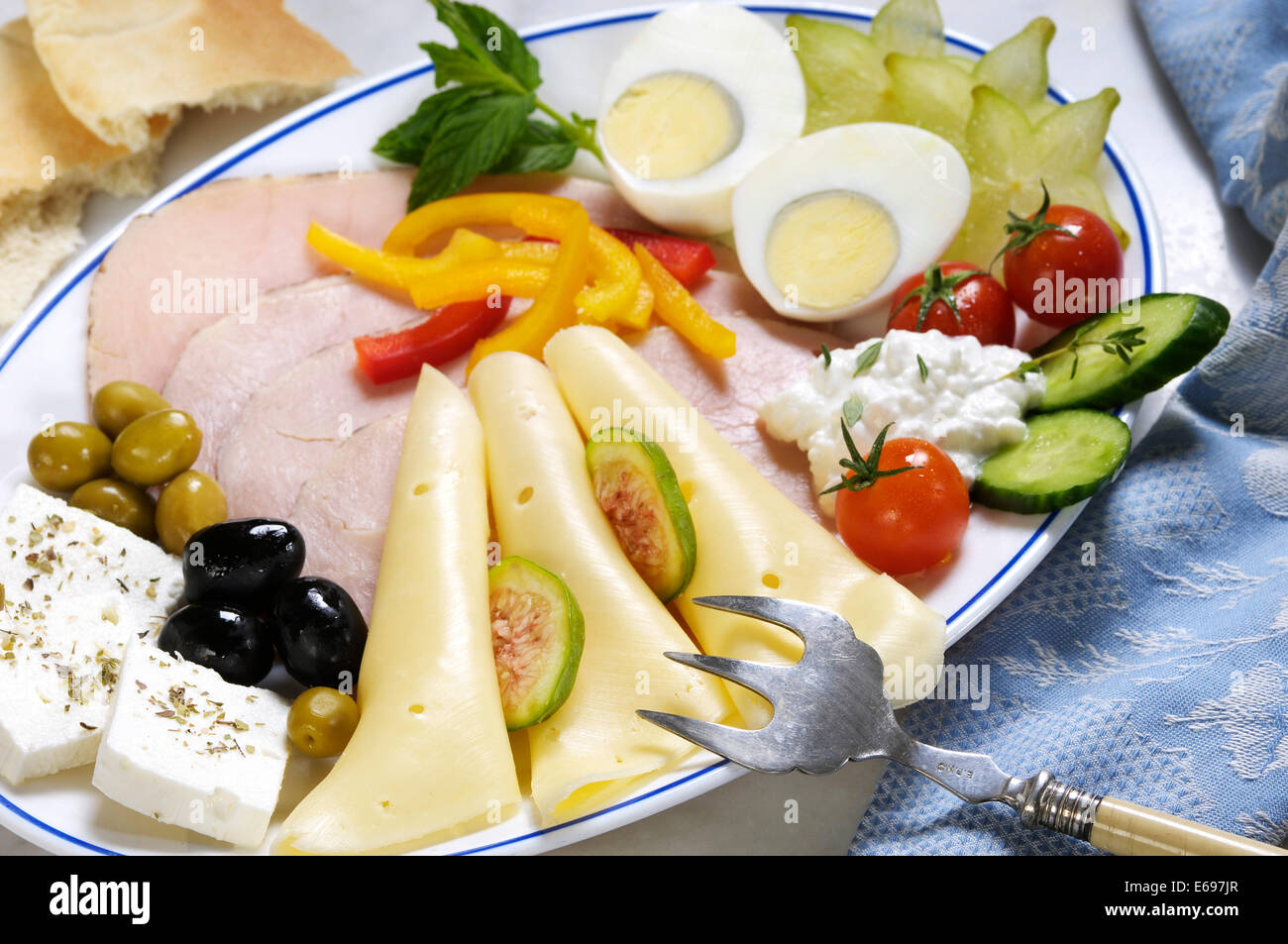 Breakfast plate with cold cuts Stock Photo - Alamy