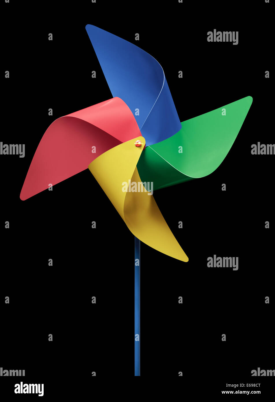 four colors pinwheel isolated on black background Stock Photo - Alamy