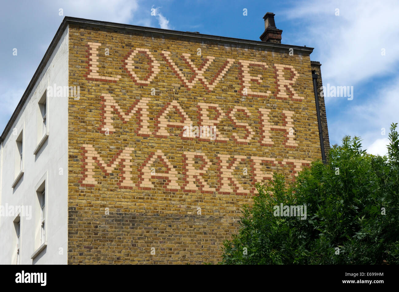 Sign for Lower Marsh Market in patterned brickwork on the side of a ...