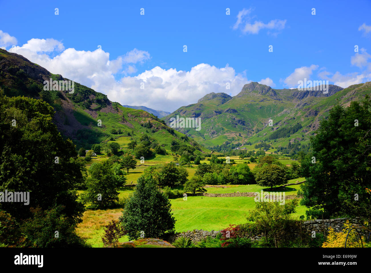 Langdale Valley Lake District Cumbria with mountains blue sky and ...