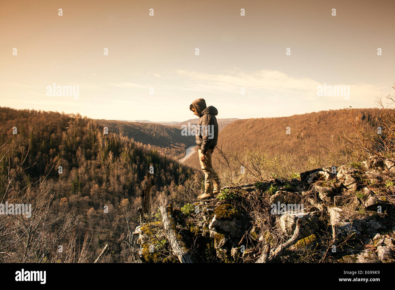 Mari man overlooking rural landscape Stock Photo - Alamy
