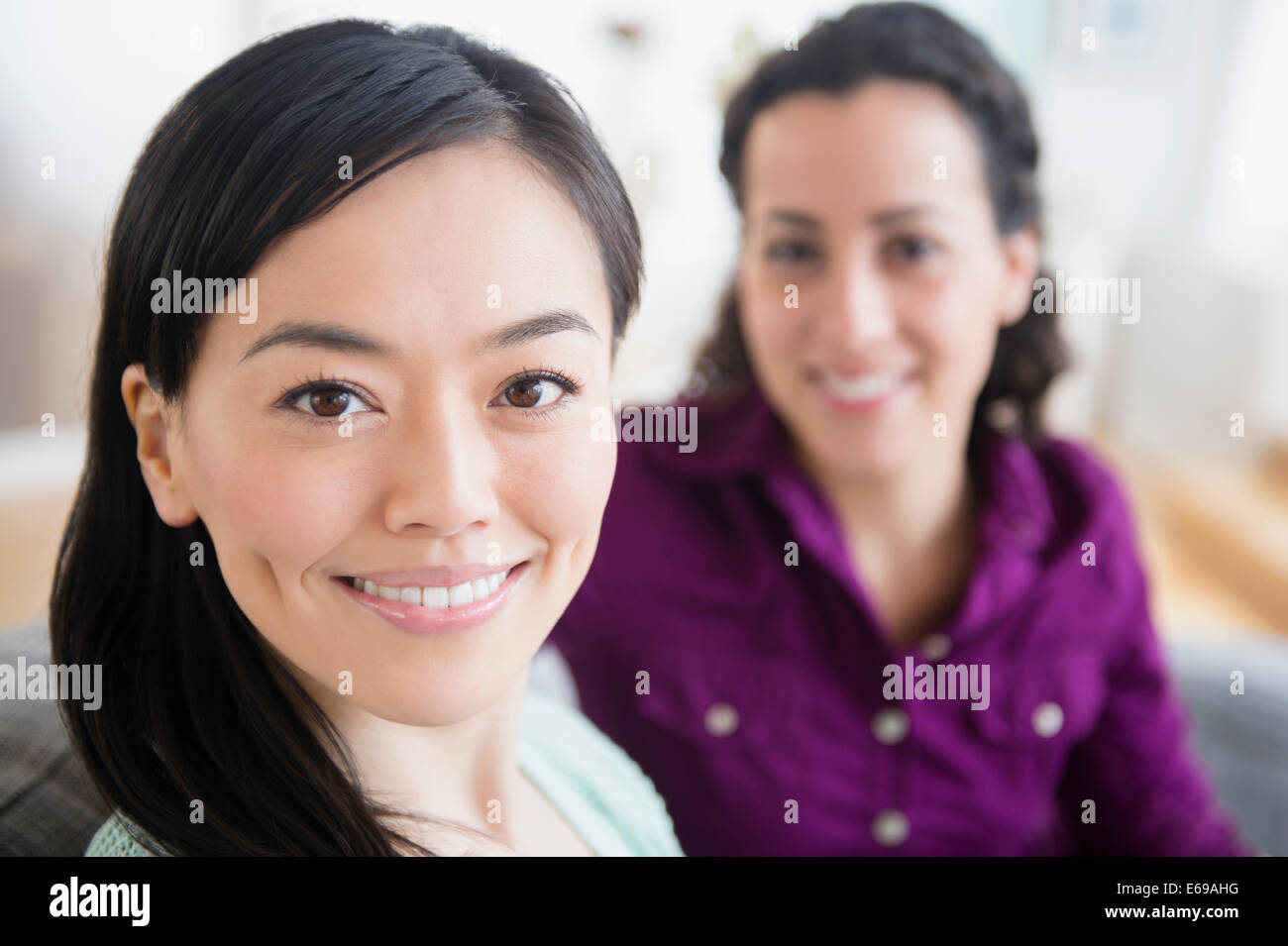Women smiling together Stock Photo - Alamy