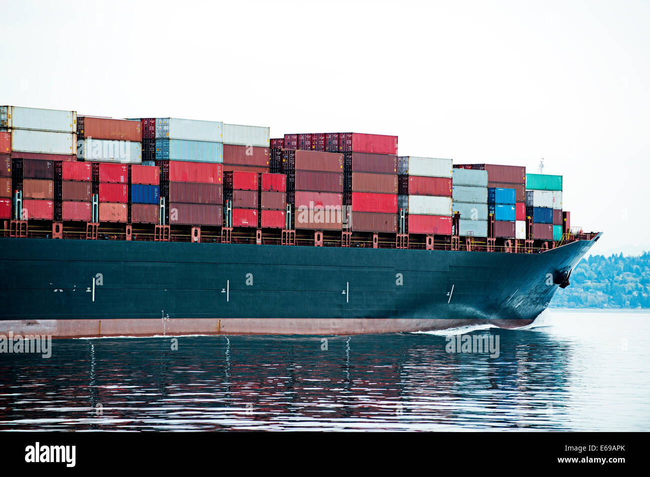 Cargo container ship on ocean Stock Photo - Alamy