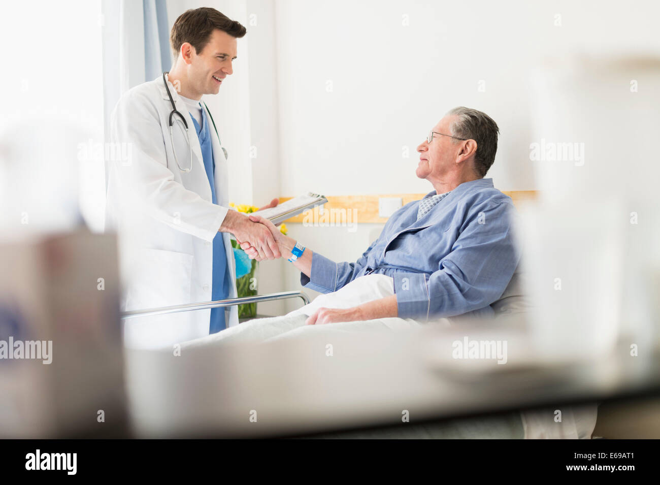 Patient Shaking Hands