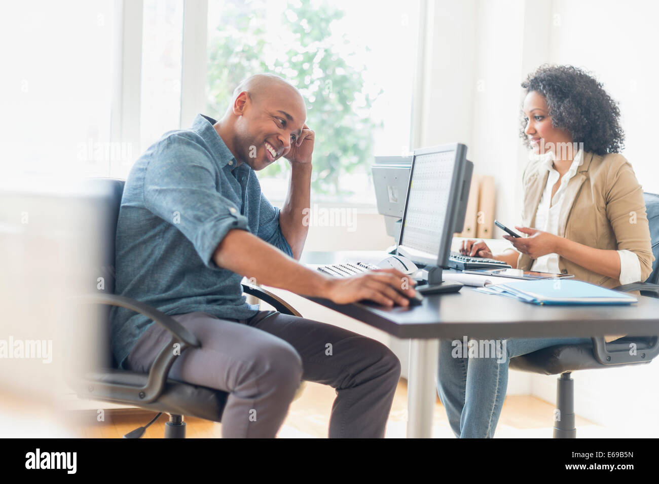 Business people working in office Stock Photo - Alamy