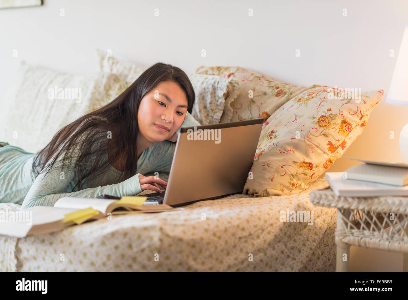Asian girl doing homework hi-res stock photography and images - Alamy