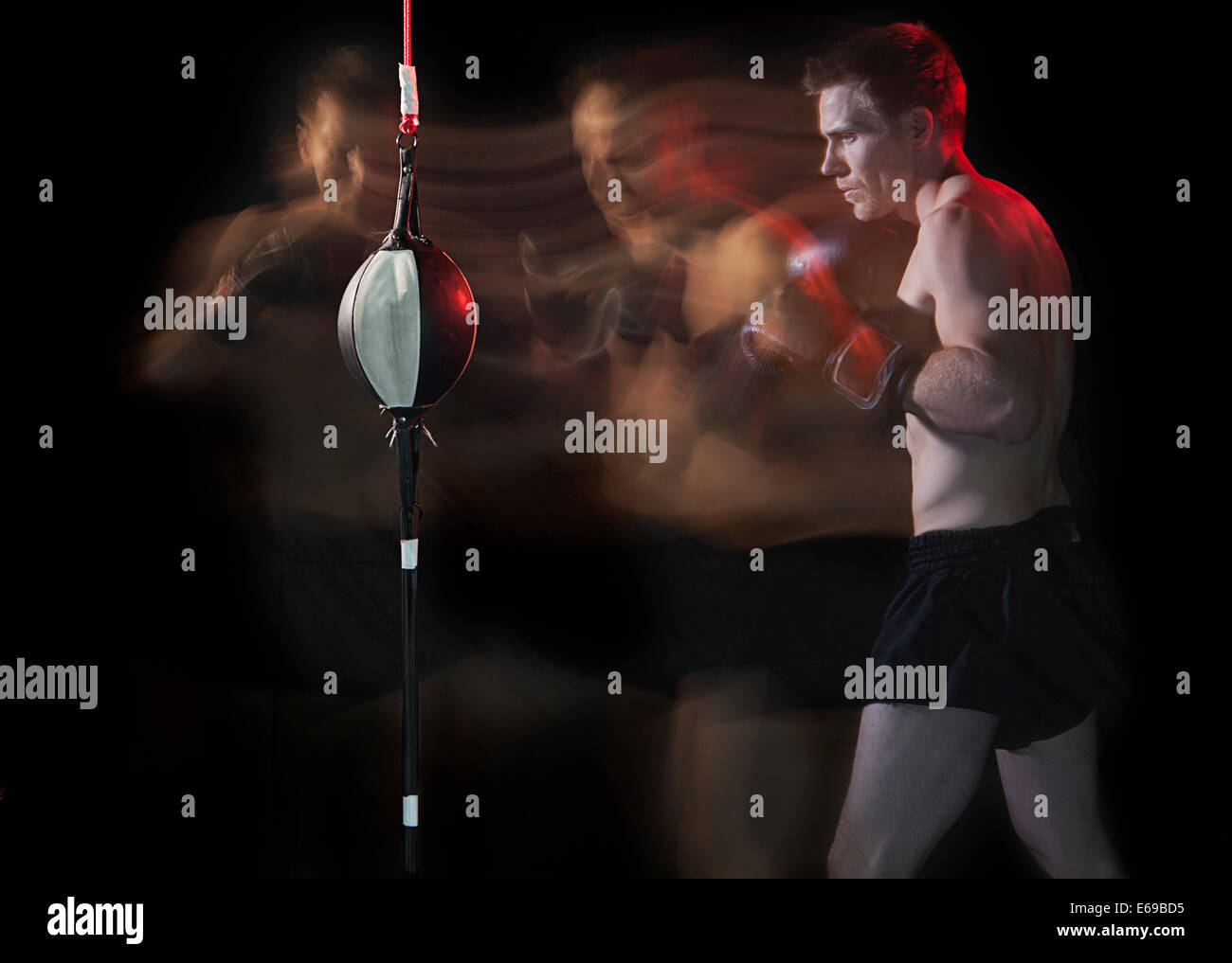 Blurred view of Caucasian boxer training Stock Photo - Alamy