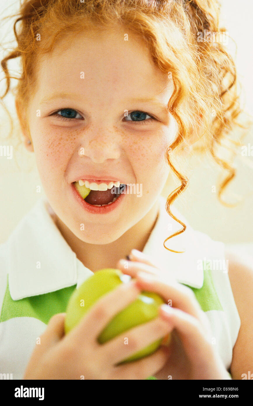 Girls are chewing apple hi-res stock photography and images - Alamy