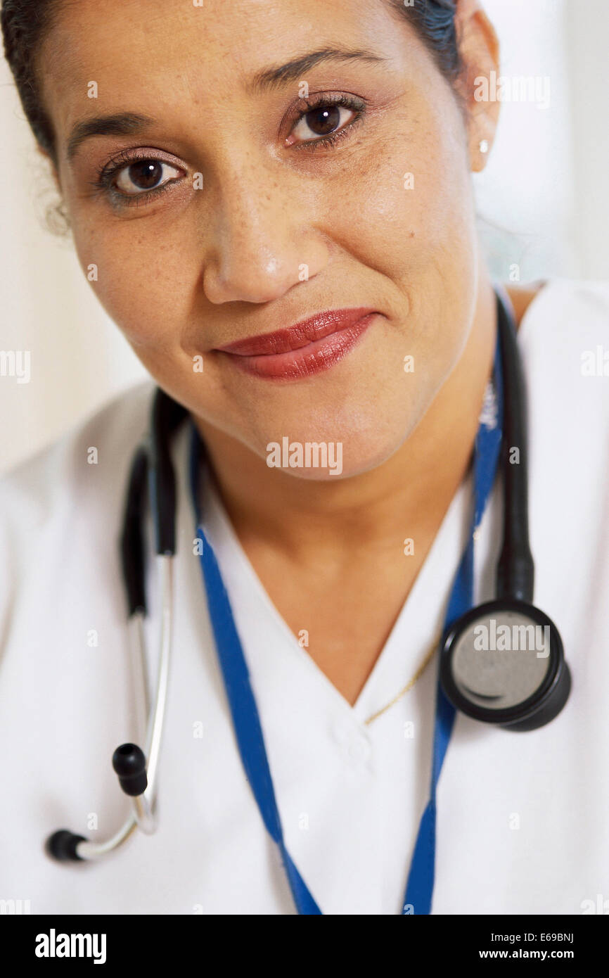 Smiling doctor wearing stethoscope Stock Photo - Alamy