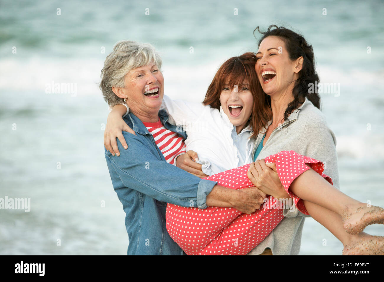 Multi generational family on beach High Resolution Stock Photography ...