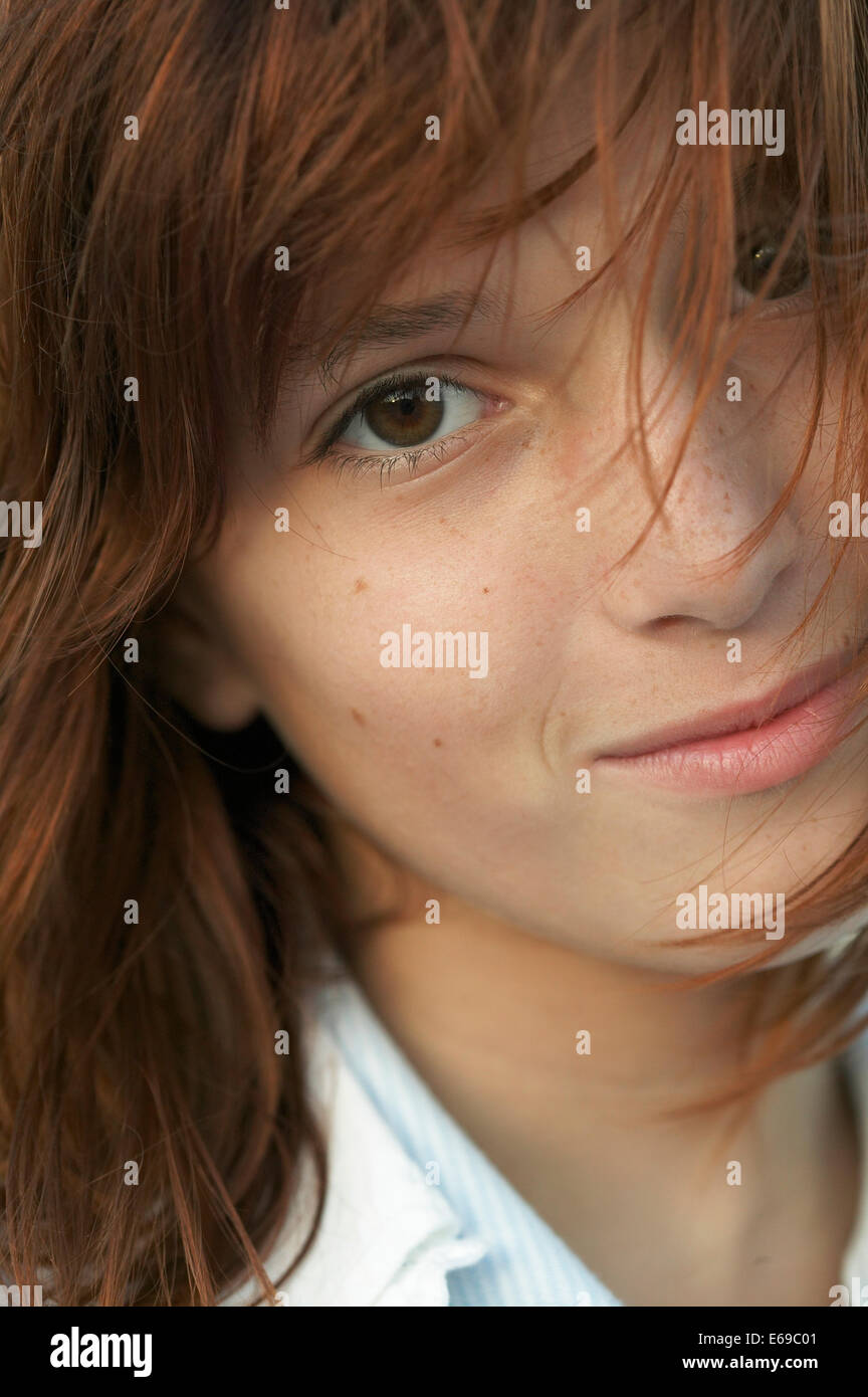 Close up of girl's smiling face Stock Photo - Alamy
