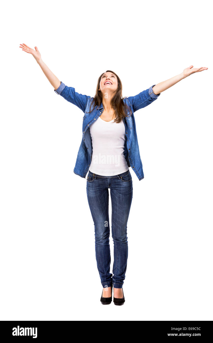 Happy woman trying to catch something falling from the sky Stock Photo ...
