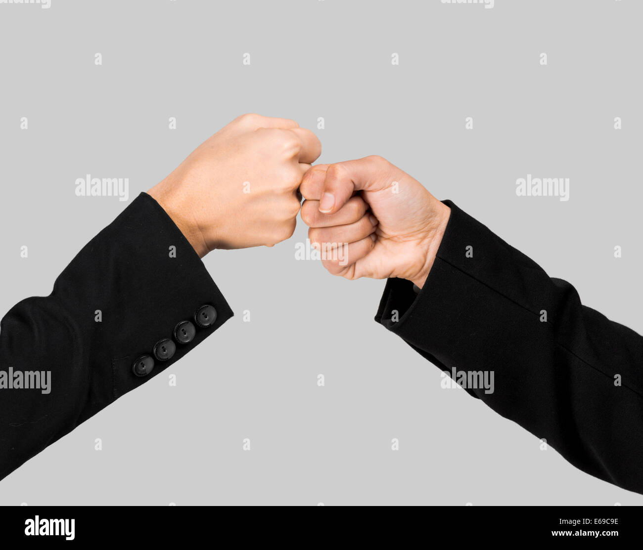 Greeting hands over a gray background Stock Photo - Alamy
