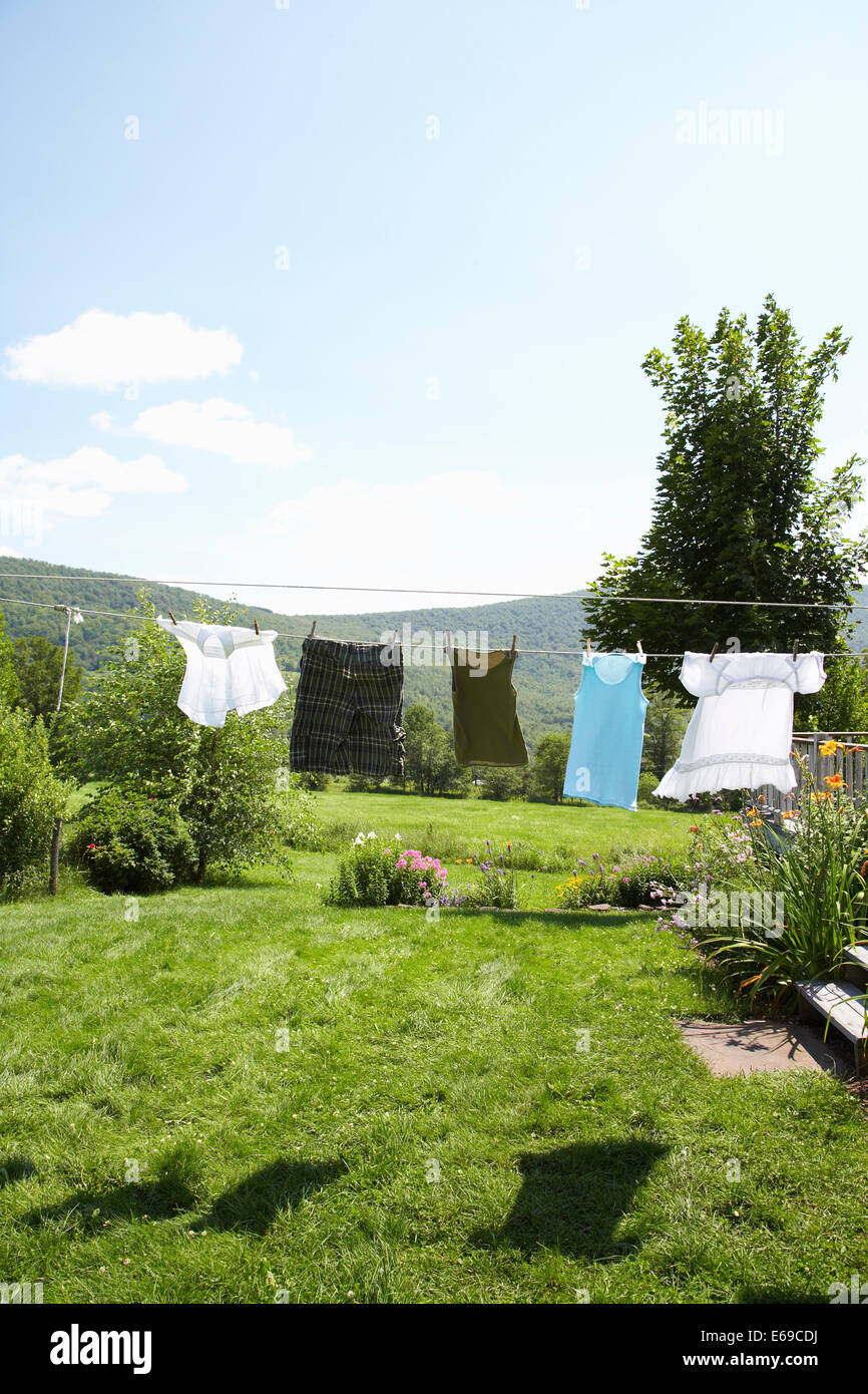 Clothesline in rural backyard Stock Photo - Alamy
