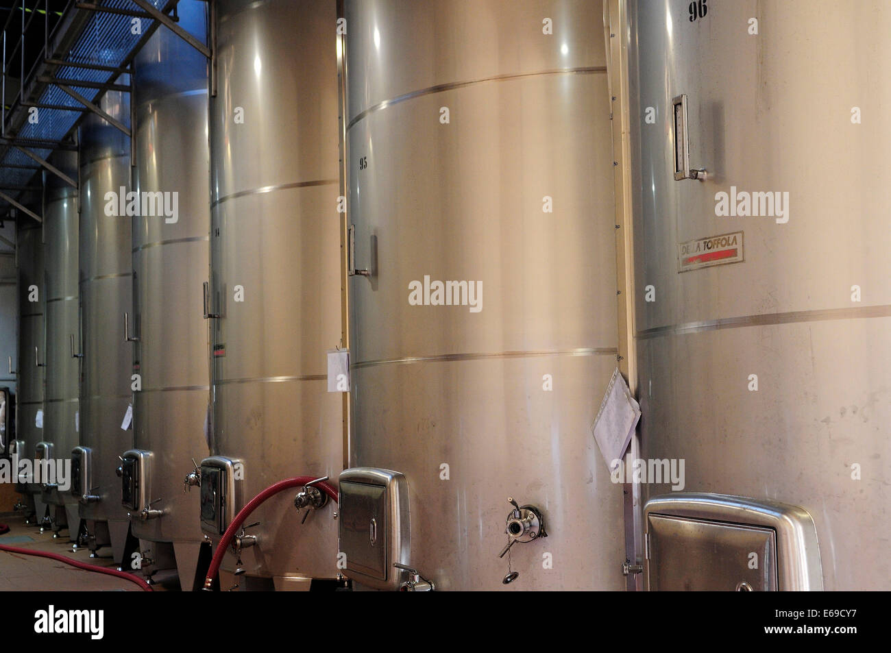 large metal vats in cellars Donnafugata, Sicily Stock Photo - Alamy