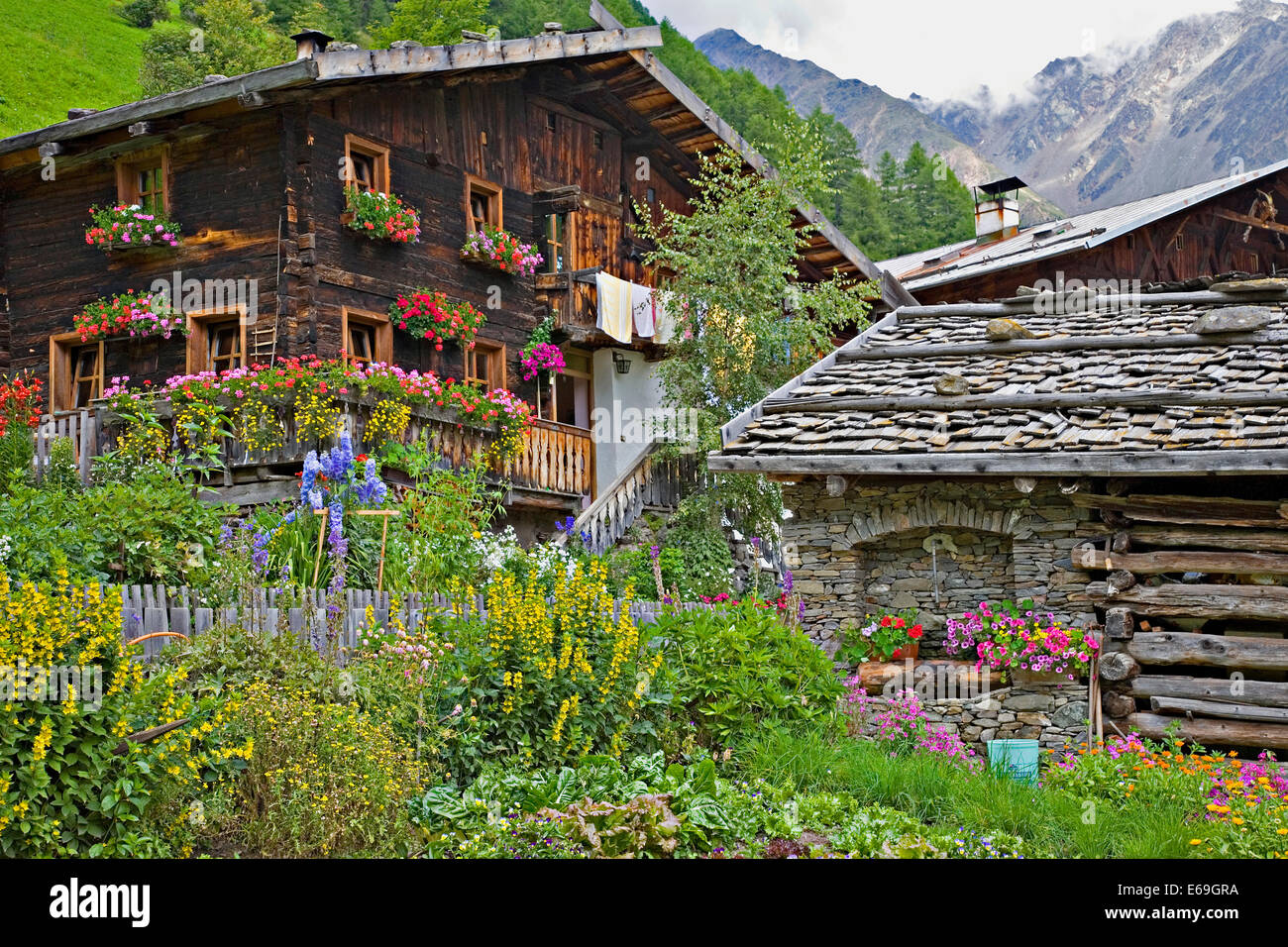 wooden house,alpin,cottage garden Stock Photo - Alamy