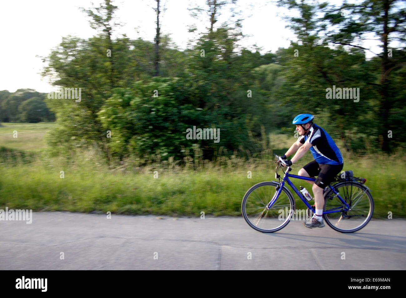 Male Over 60 Cycling High Resolution Stock Photography and Images - Alamy