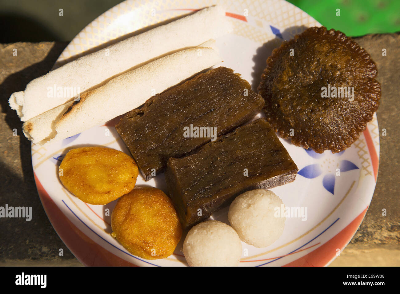 Assamese cake hi-res stock photography and images - Alamy