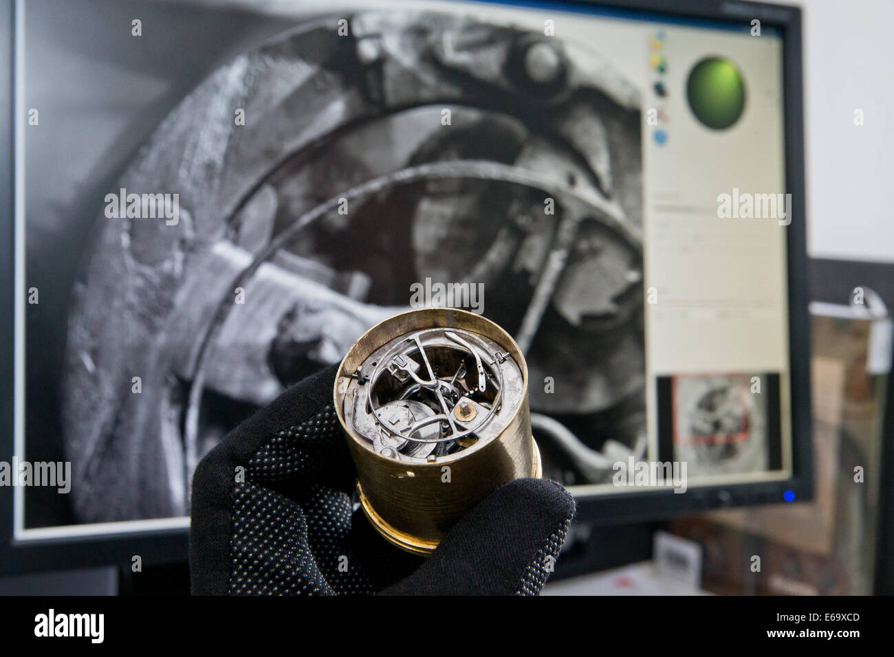Nuremberg, Germany. 18th Aug, 2014. The Henlein watch is held in front ...