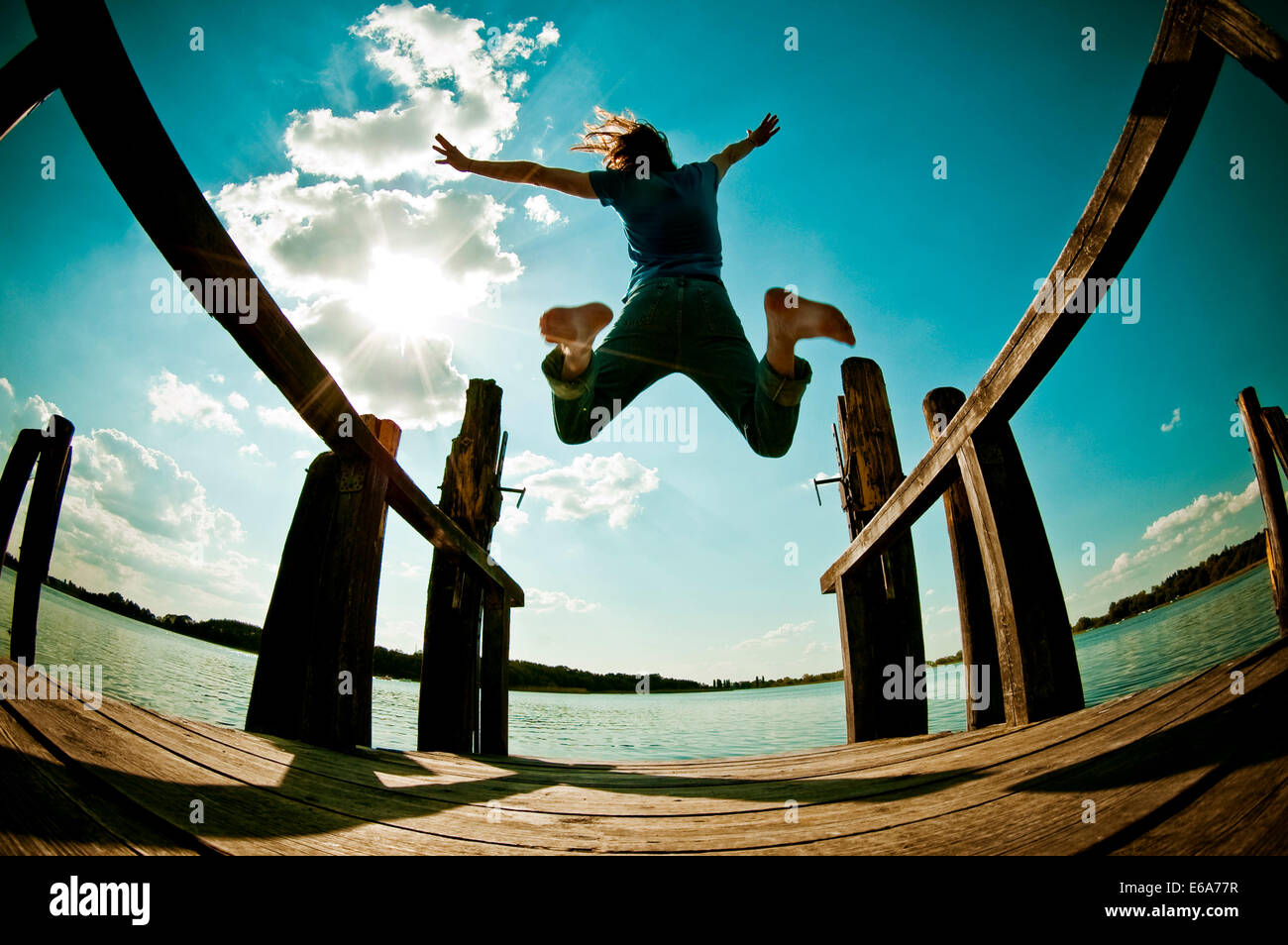 Back Person Jumping High Resolution Stock Photography and Images - Alamy