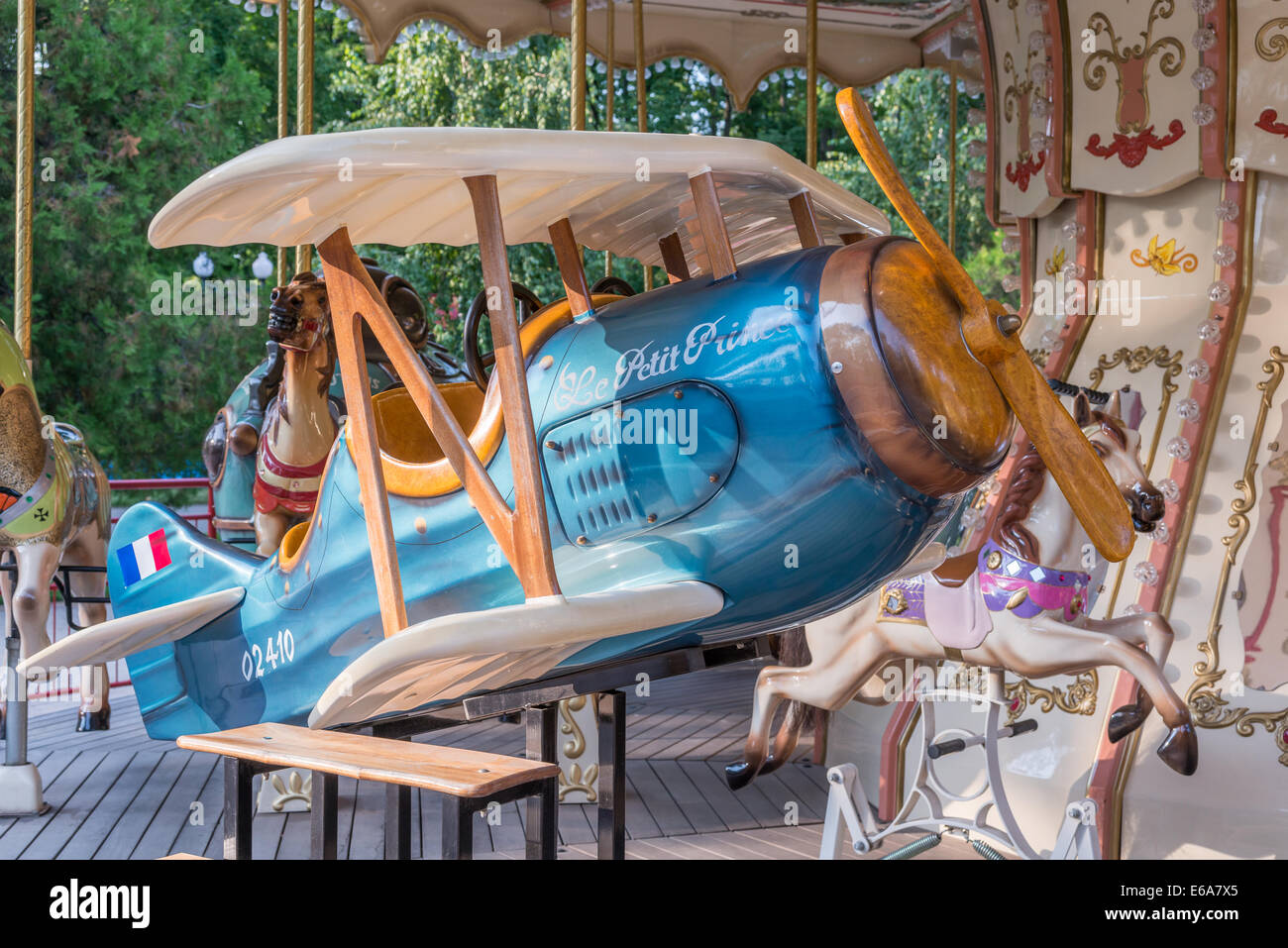 nice airplane of a coloured carousel in a park Stock Photo - Alamy