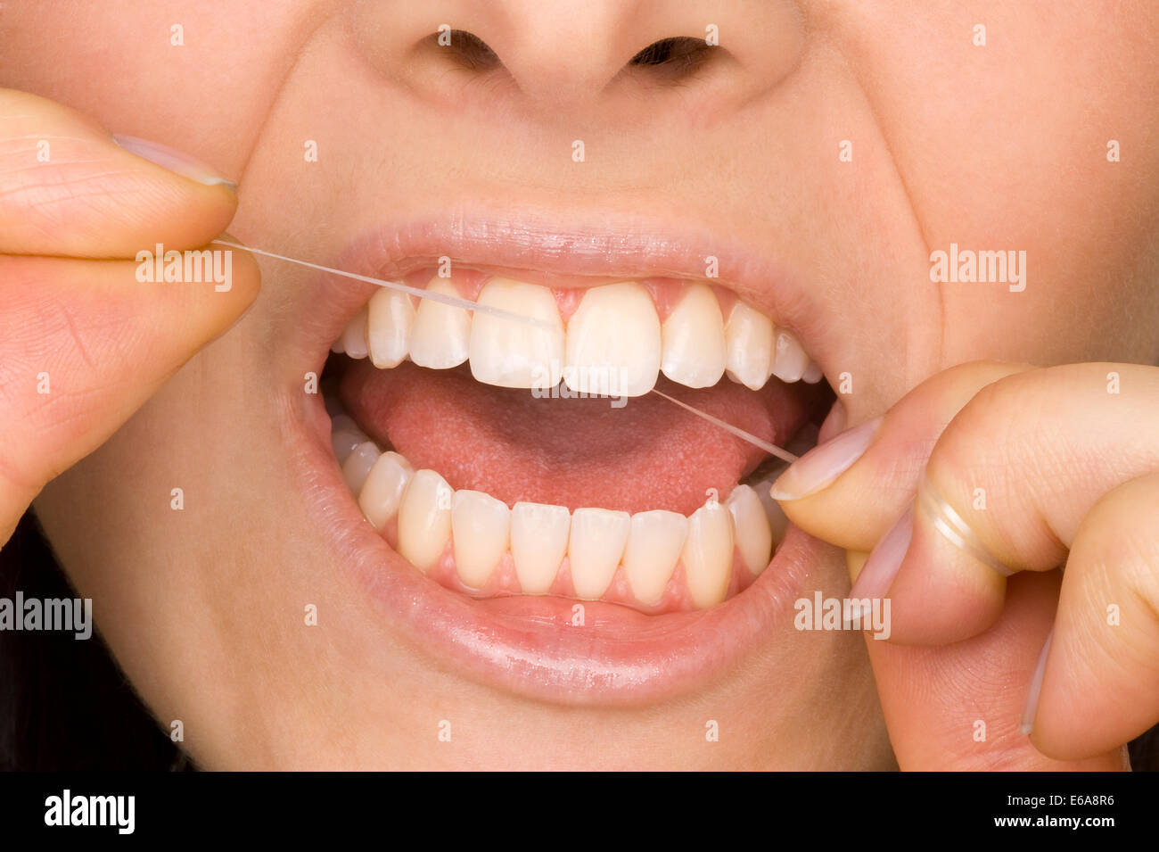 dental floss,tooth cleaning Stock Photo - Alamy