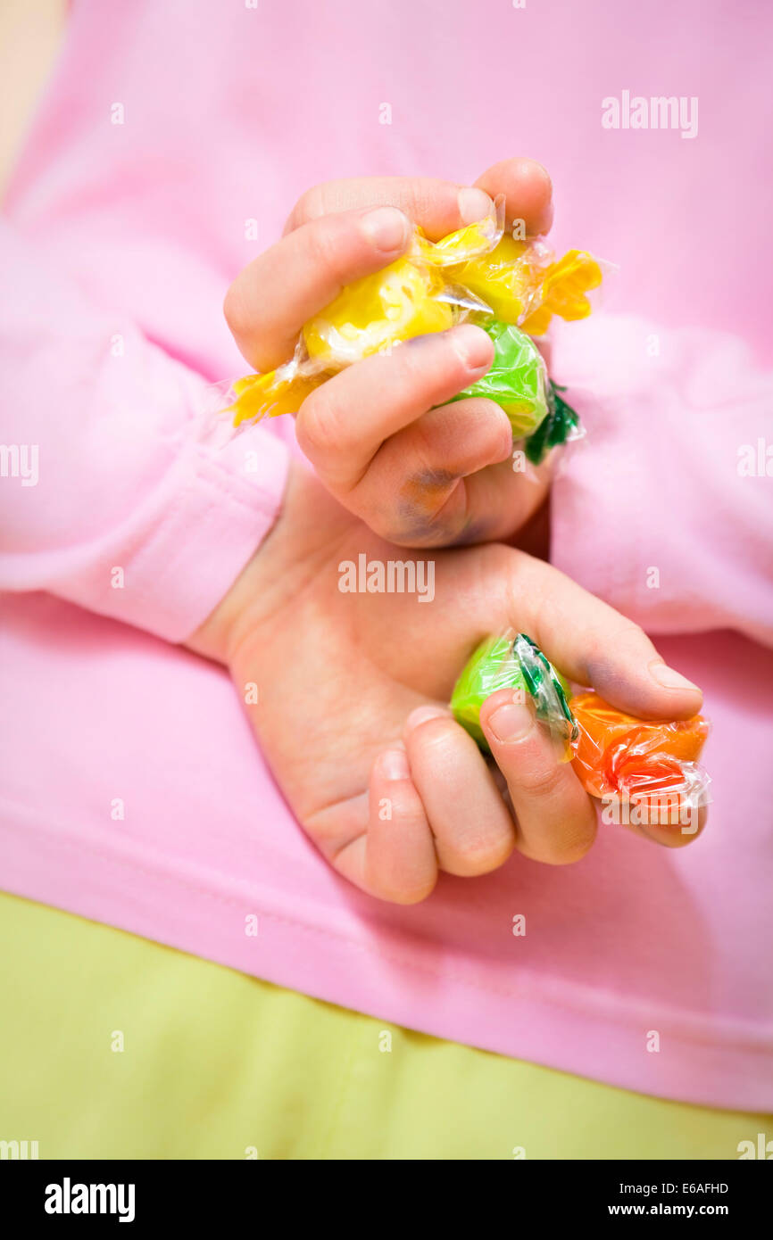 5 year old girl with sweets hi-res stock photography and images - Alamy
