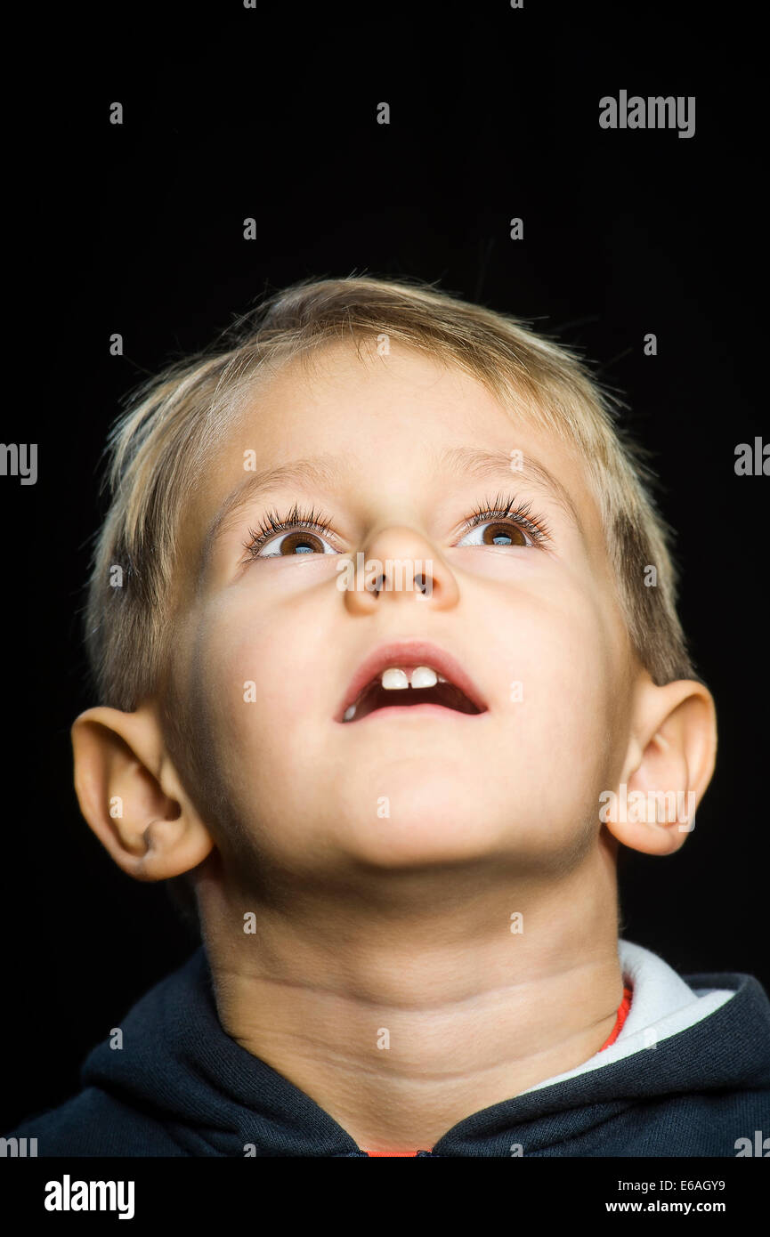 boy looking upwards Stock Photo - Alamy