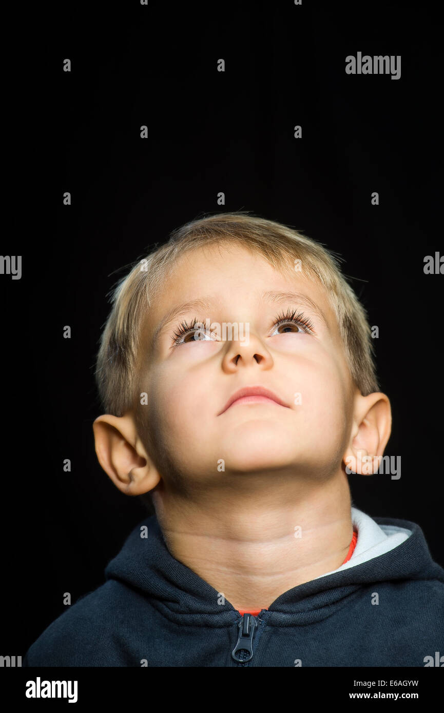 boy looking upwards Stock Photo - Alamy