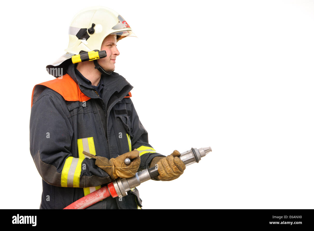 Fireman holding fire hose Cut Out Stock Images & Pictures - Alamy
