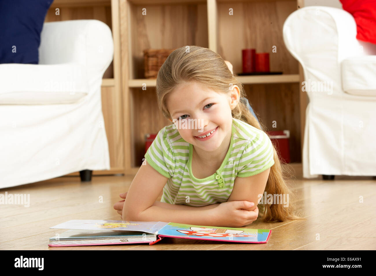 6 8 year old reading a book hi-res stock photography and images - Alamy
