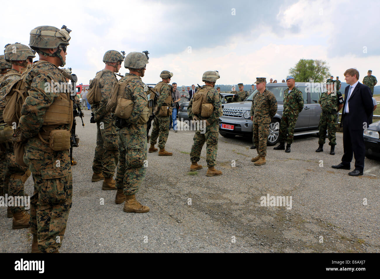 U.S. Marine Corps Lt. Col. Trevor Hall, center right, the commanding ...