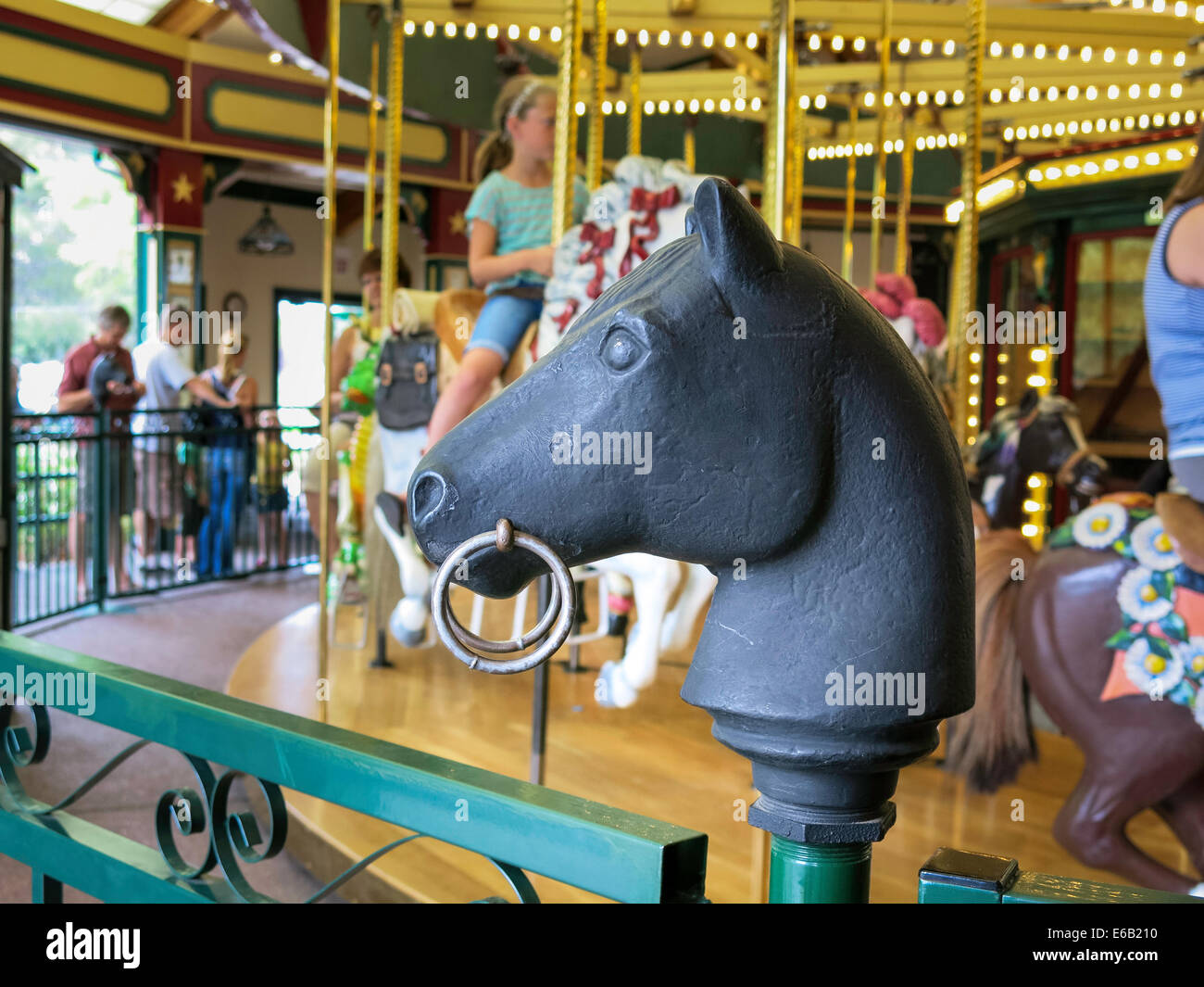 People on carousel roundabout hi-res stock photography and images - Alamy