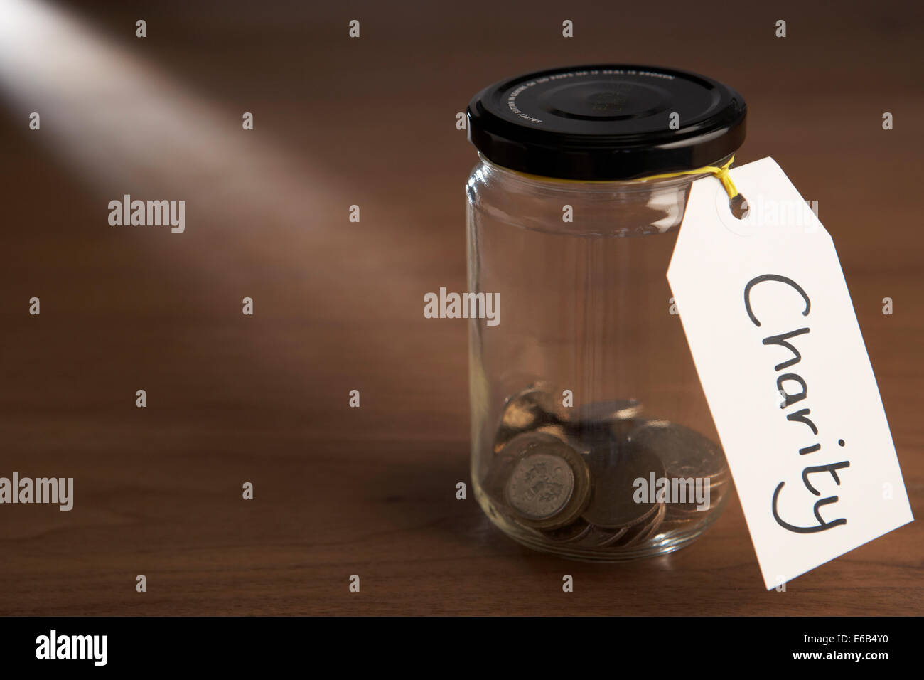 Donating money charity box hi-res stock photography and images - Alamy