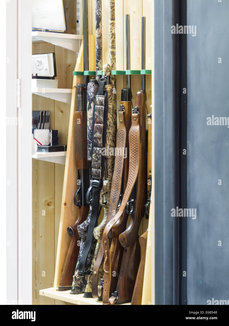 Rifles and Shotguns in Home Gun Safe, Residential Home, MT, USA Stock ...
