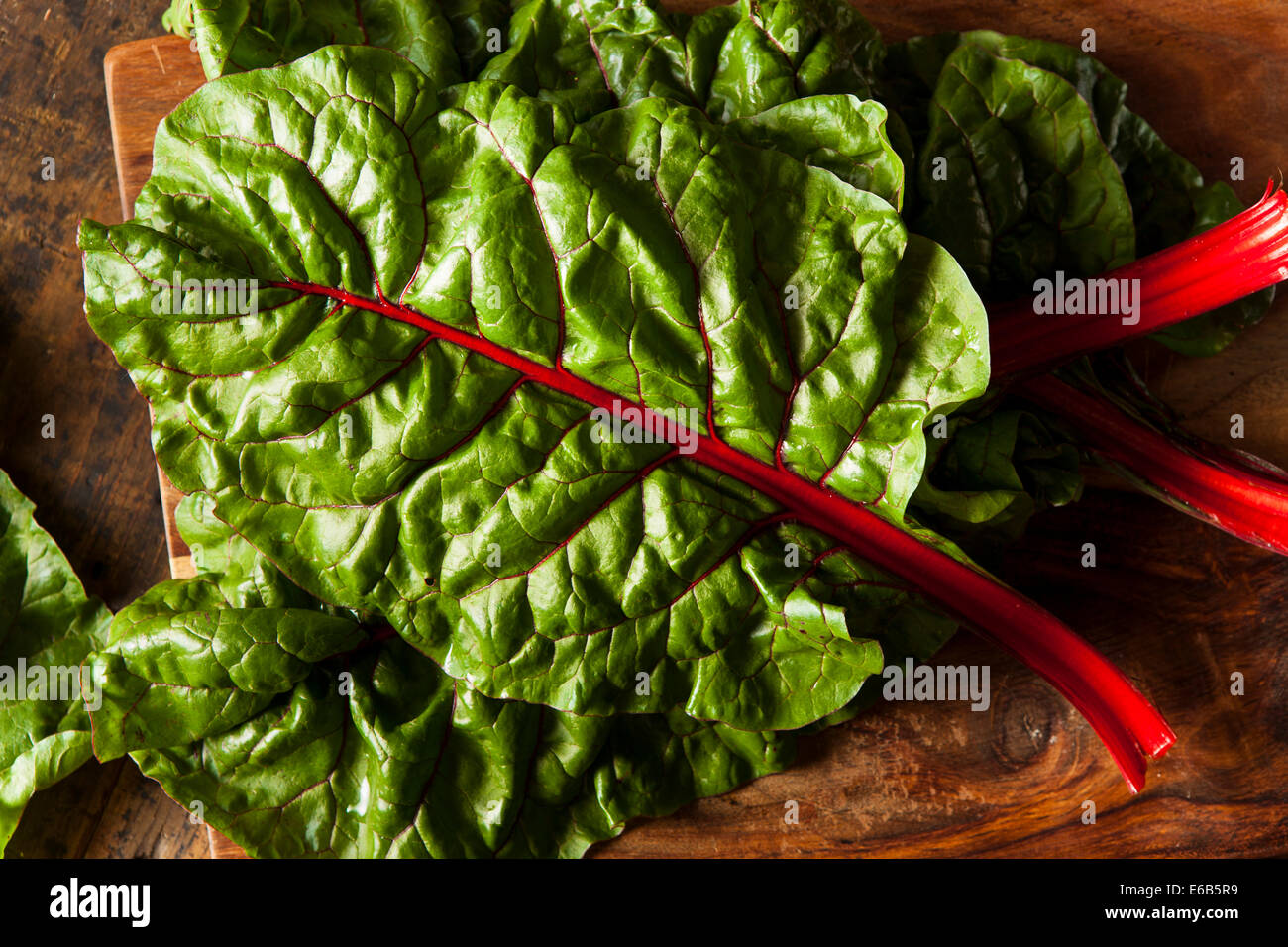 Raw Organic Red Swiss Chard on a Background Stock Photo - Alamy