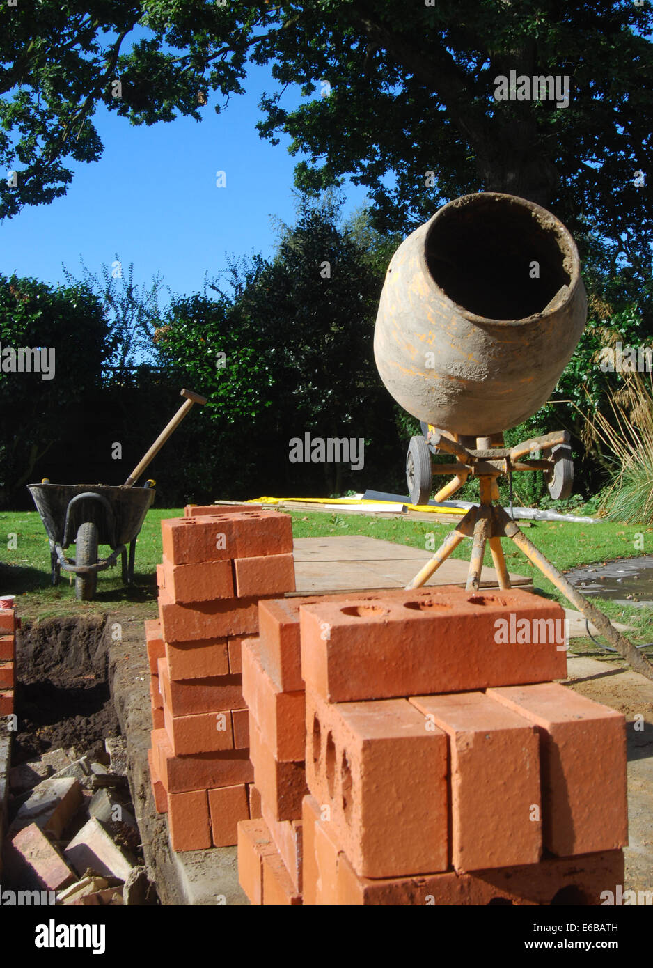Small construction site showing tools and materials in house garden ...