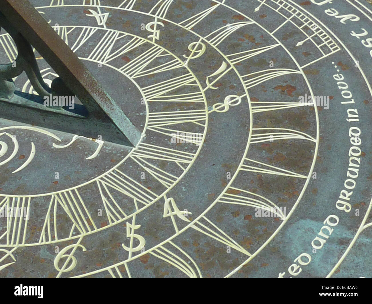 Closeup of the face of an old sundial Stock Photo - Alamy