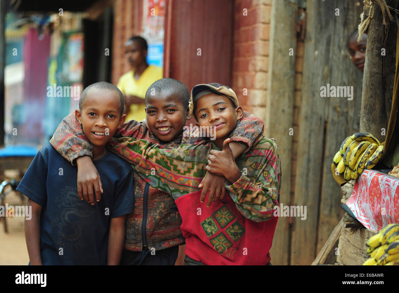 Madagascar, Ambalavao, Three African boys hugging and smiling Stock ...