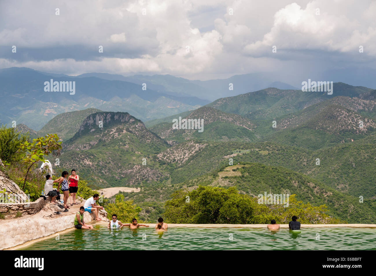 Mexico, Oaxaca. Hierve el Agua is a popular place to relax in the ...