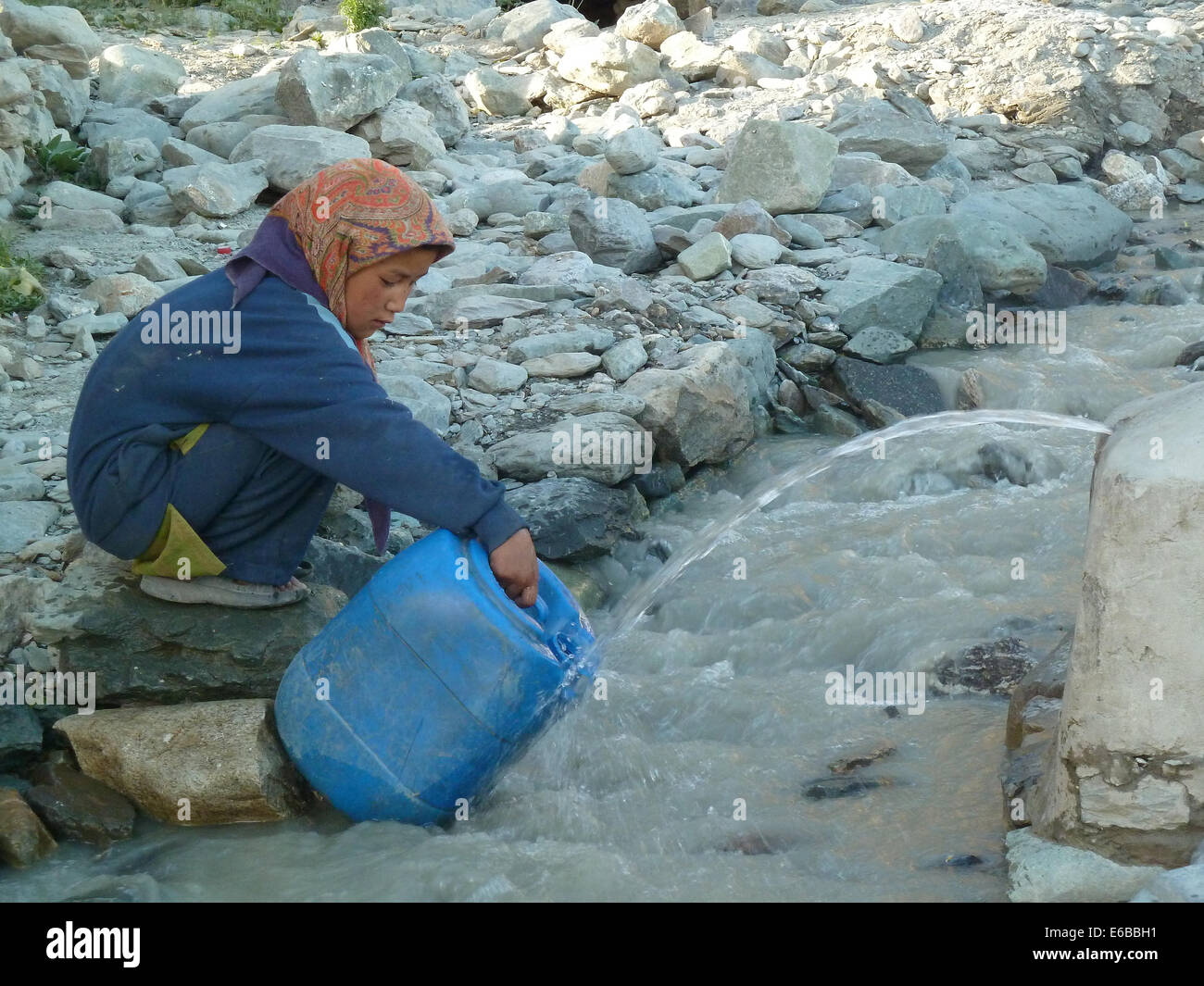 Young girl collecting water in Karsha Village, near Padum, Zanskar ...