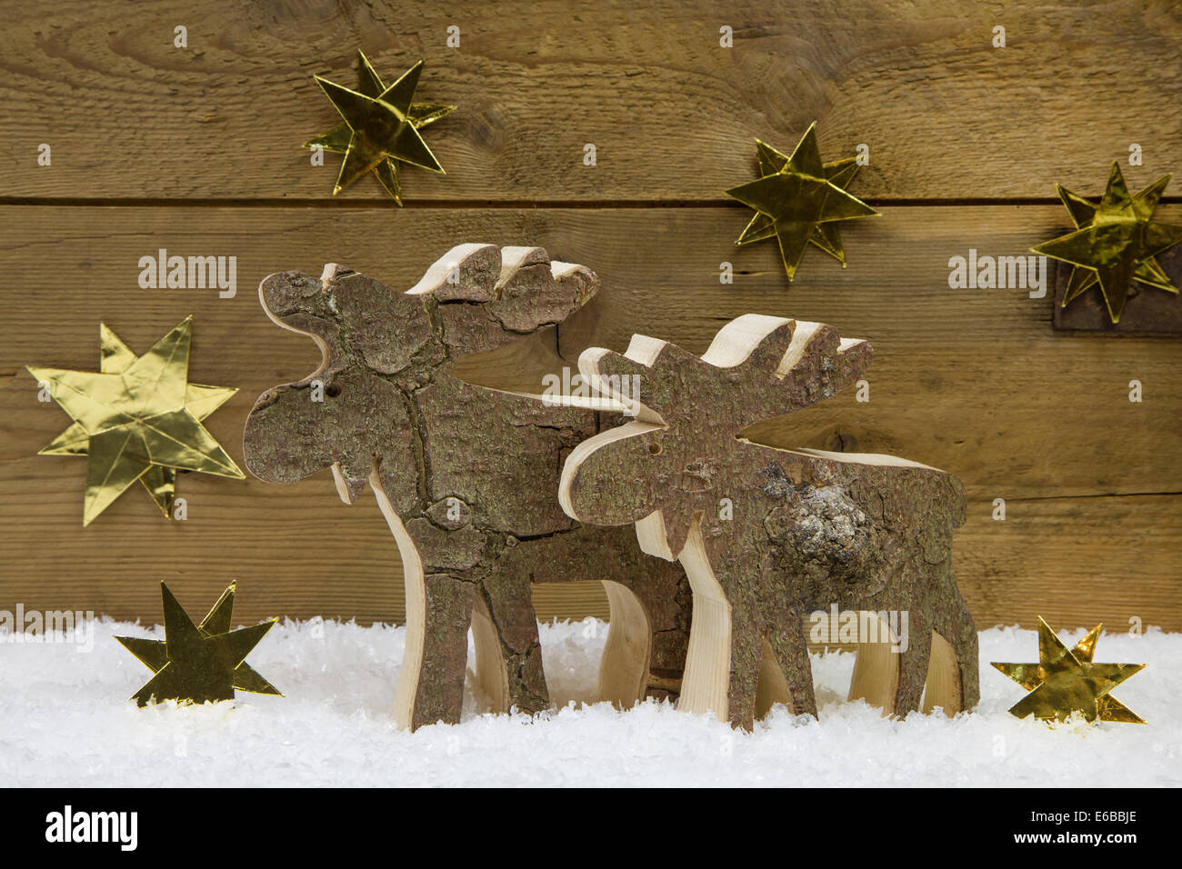 Two wooden handmade reindeer for christmas decoration with natural ...